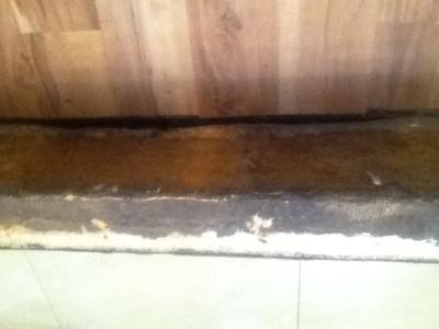 Installing a threshold over a 4" gap from a tile kitchen floor to the ...